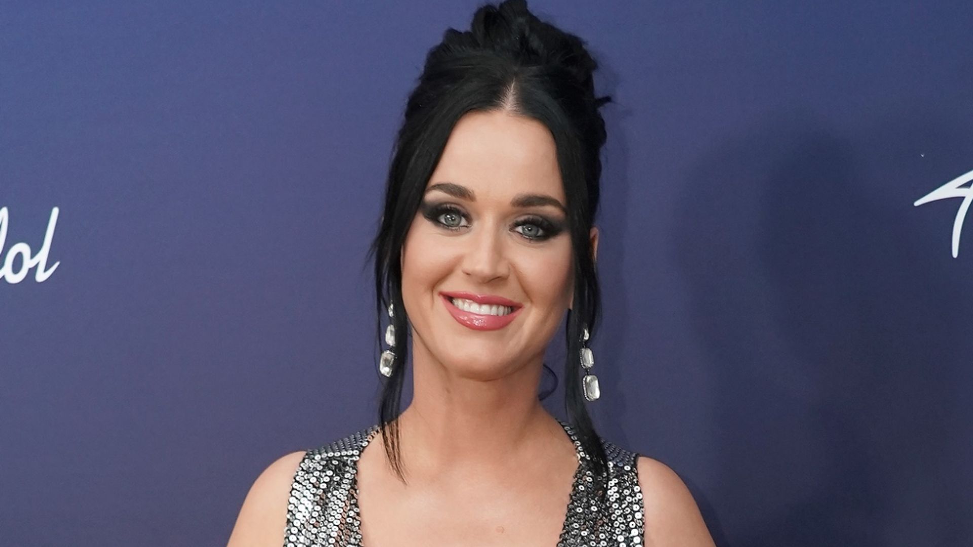 Katy Perry highlights hourglass figure in plunging top and leather ...