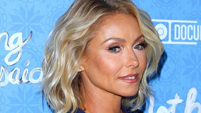 Kelly Ripa is red hot in daring plunging dress as fans weigh in | HELLO!