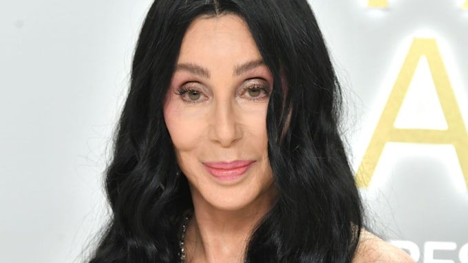 Cher, 76, dazzles in a fishnets and edgy thigh-split gown | HELLO!