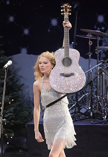 Taylor Swift stuns in thigh-skimming mini dress for shock appearance ...