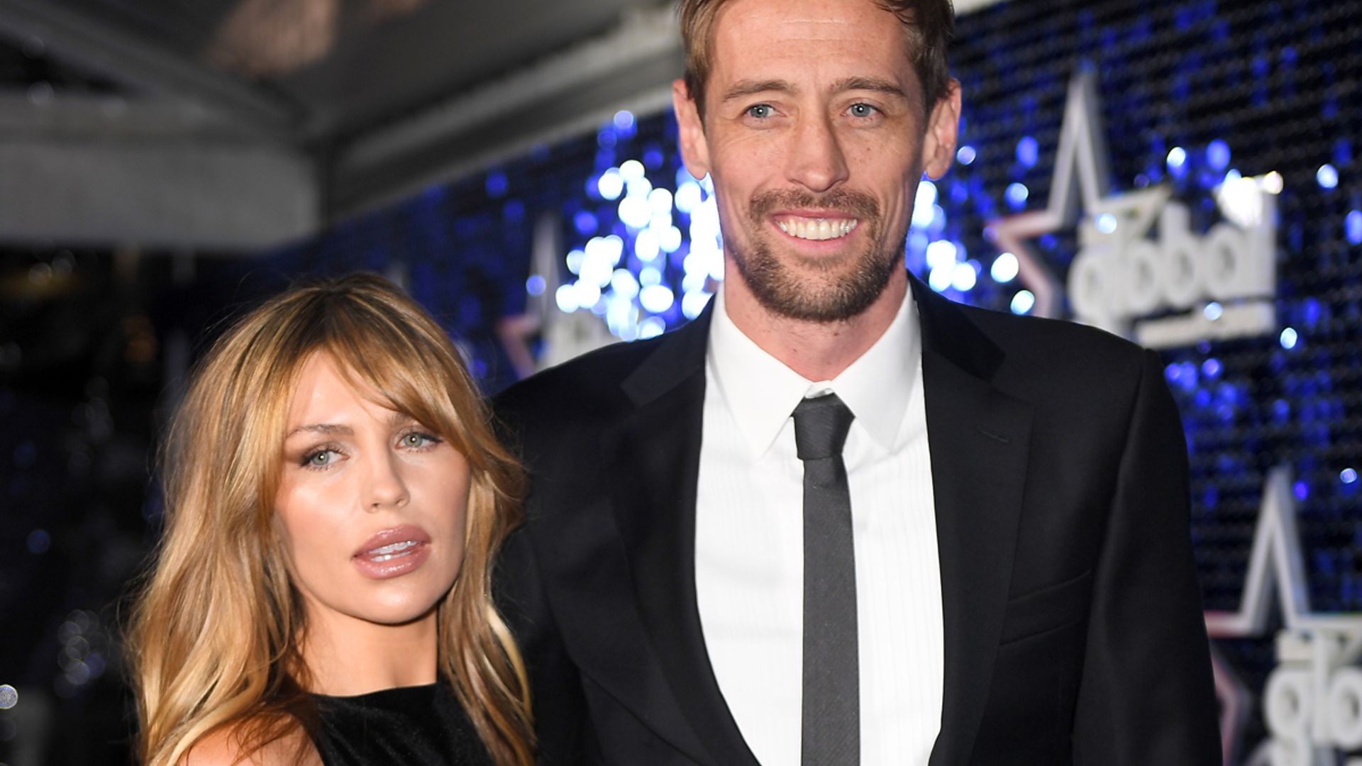 Abbey Clancy wears TINY red mini dress to announce big news with Peter ...