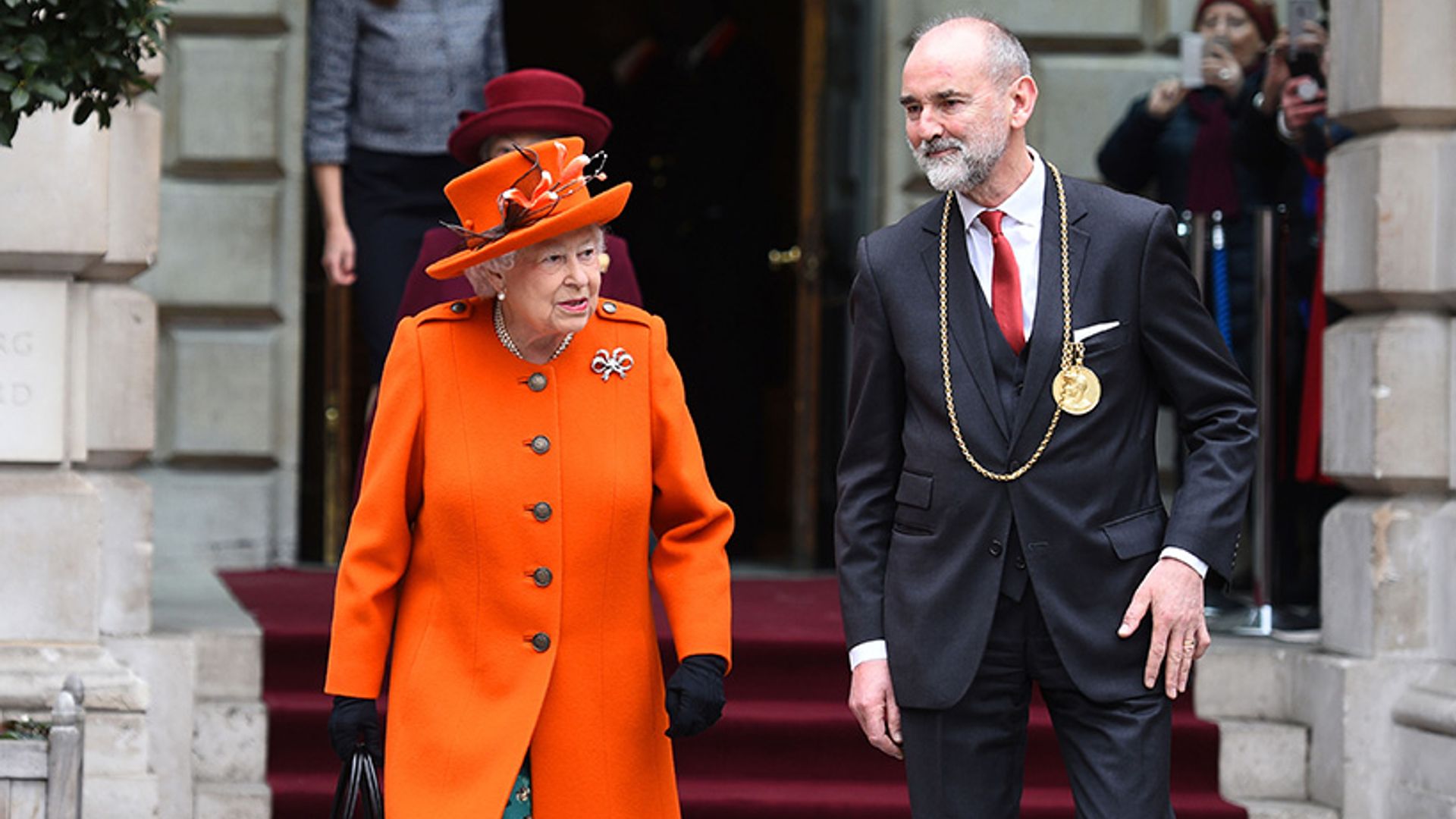The Queen stuns in orange coat dress and matching hat at the Royal ...