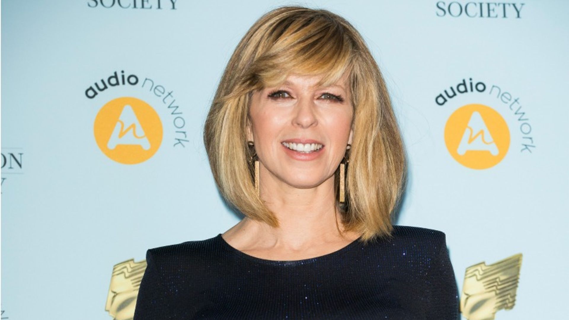 Kate Garraway looks amazing in this white summer coat - and it looks ...