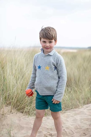 Prince Louis' star jumper in new birthday portraits is so adorable | HELLO!