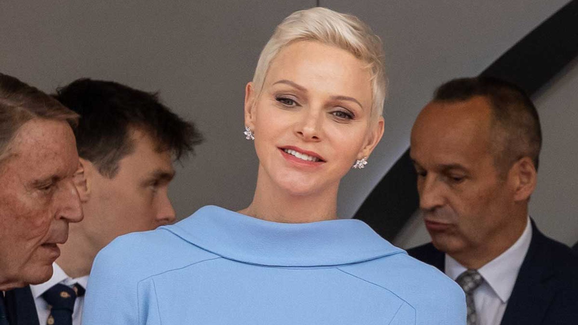 Princess Charlene rocks very edgy top and bold red lipstick in ...