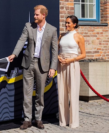 Meghan Markle WOWS in shoulder-baring-top & trousers that'll make you ...