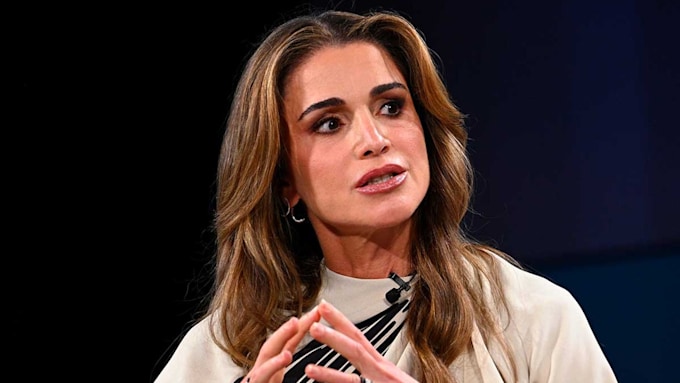 Queen Rania is a vision in silky designer shirt and heels | HELLO!