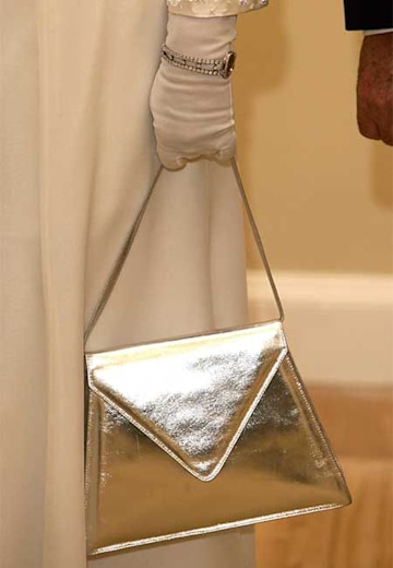 Queen Elizabeth II’s best handbag moments - do you remember these? | HELLO!