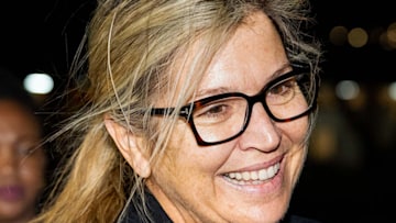 Queen leaves plane wearing unusual accessory and royal fans have ...