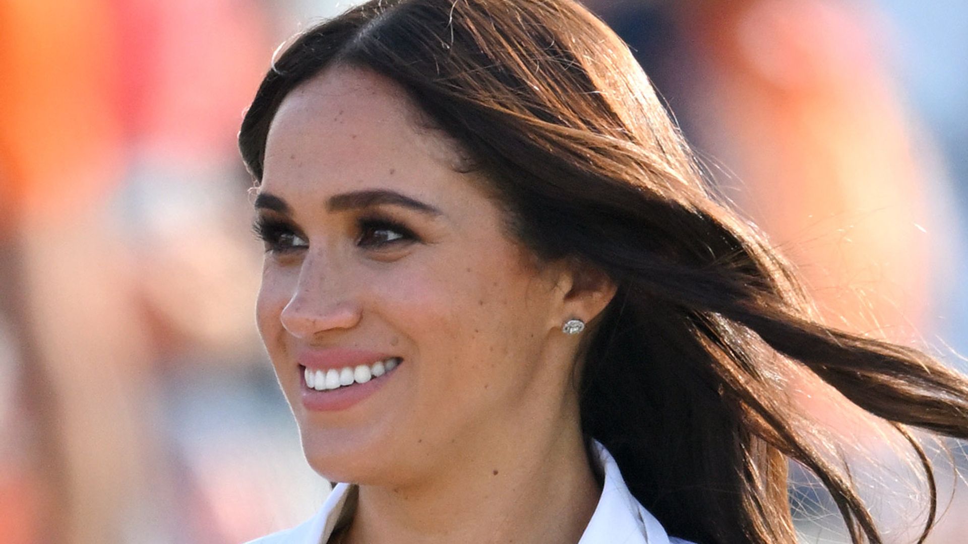 Meghan Markle wears new slinky top - wait 'till you see the back | HELLO! Meghan Markle wears new slinky top - wait 'till you see the back | HELLO!