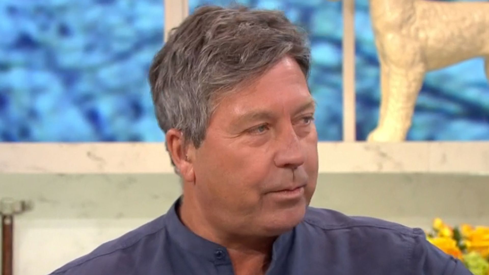 John Torode returns to This Morning with incredible post-honeymoon tan ...