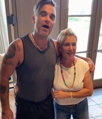 Robbie Williams' mum SHOCKS fans with incredibly youthful looks – see ...