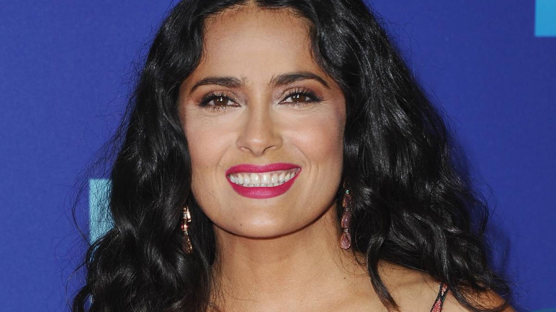 Salma Hayek stuns with super long hair in new beach photo – and fans ...