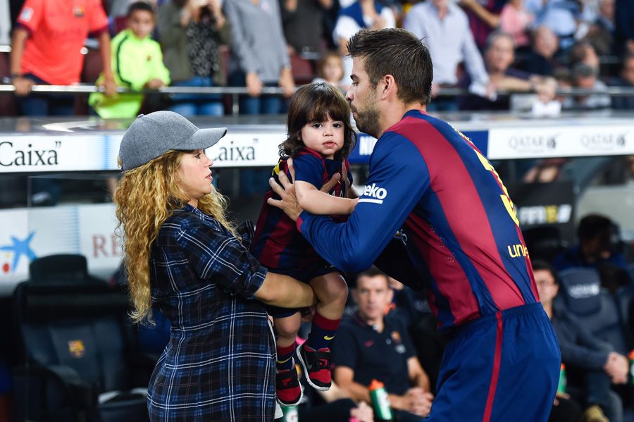 Shakira shows off baby bump with son Milan at Gerard Pique's football ...
