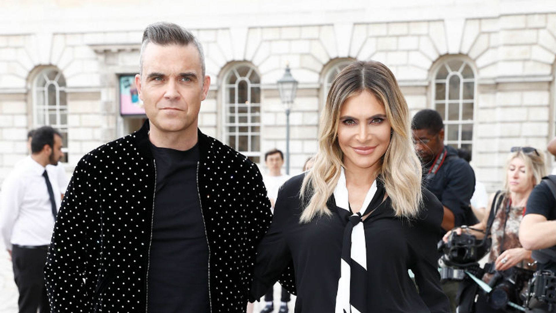 Robbie Williams' baby daughter Coco is already a mini fashionista – see ...