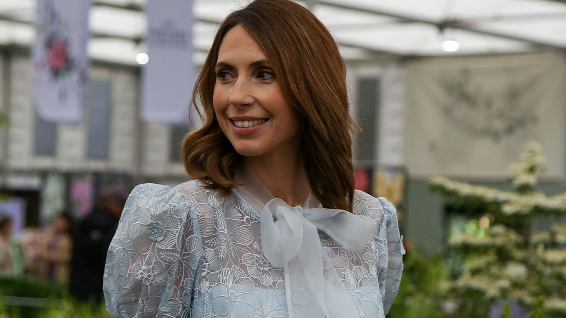 Alex Jones puts on united front with rarely pictured husband and kids ...