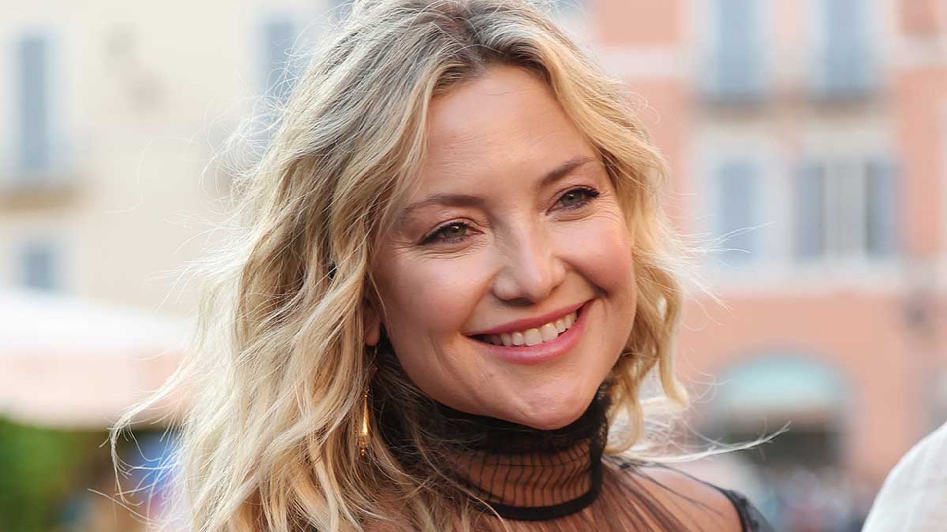Kate Hudson whips up fashion frenzy in sheer top and slinky trousers ...