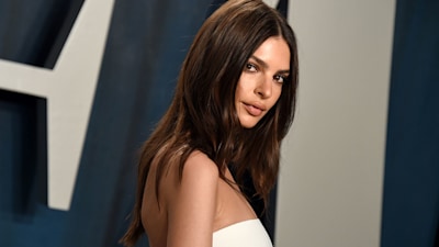 Emily Ratajkowski dons double-split skirt and knee-high boots for ...