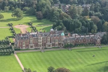 The Queen looks so glamorous posing in her library in iconic photo | HELLO!