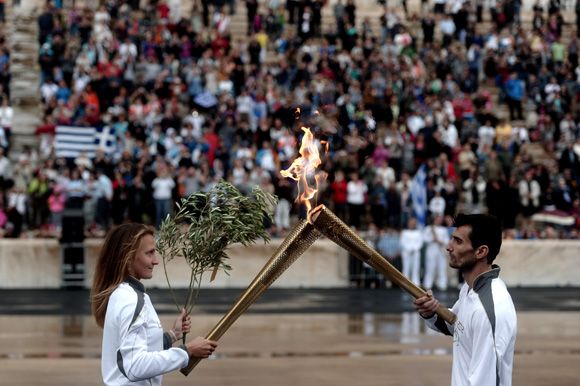 Princess Anne receives the Olympic torch | HELLO!