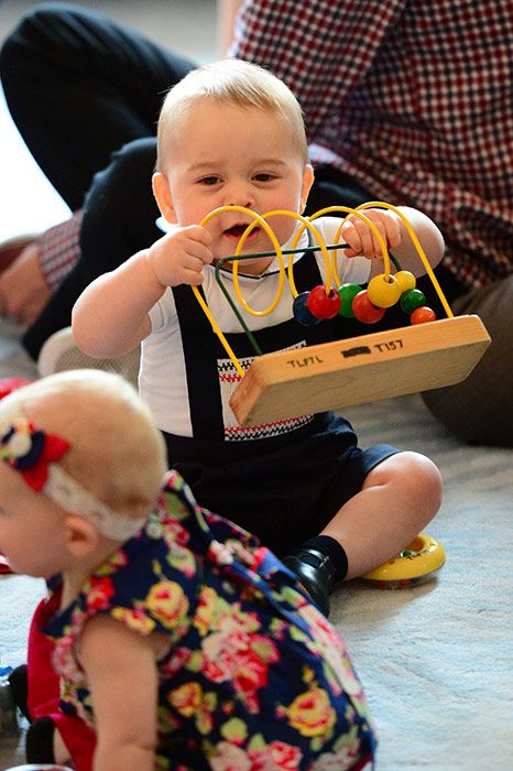 Royal tour: Prince George pictured playing on first official engagement ...