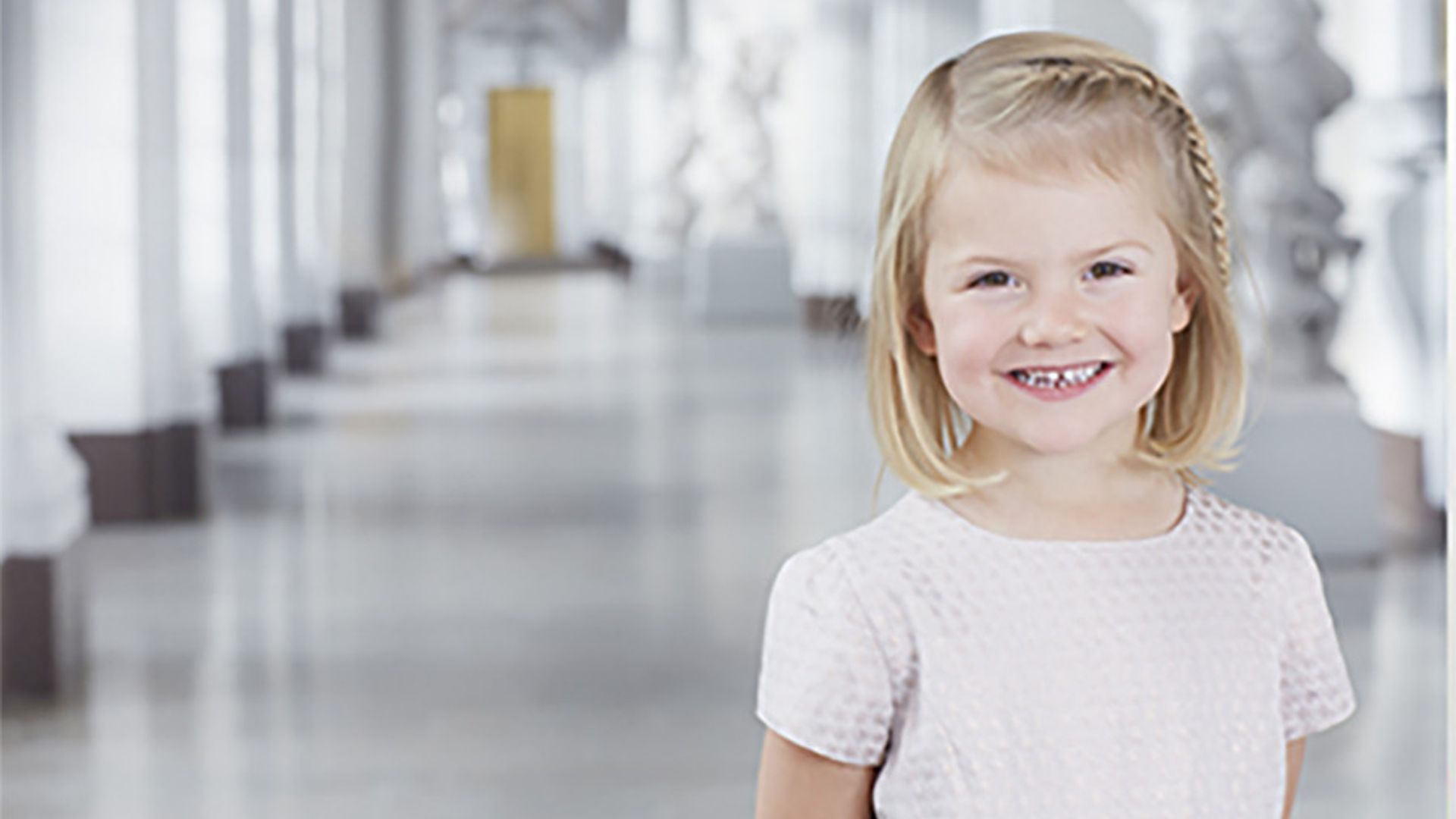 Princess Estelle sweetly cradles brother Prince Oscar in new photos ...