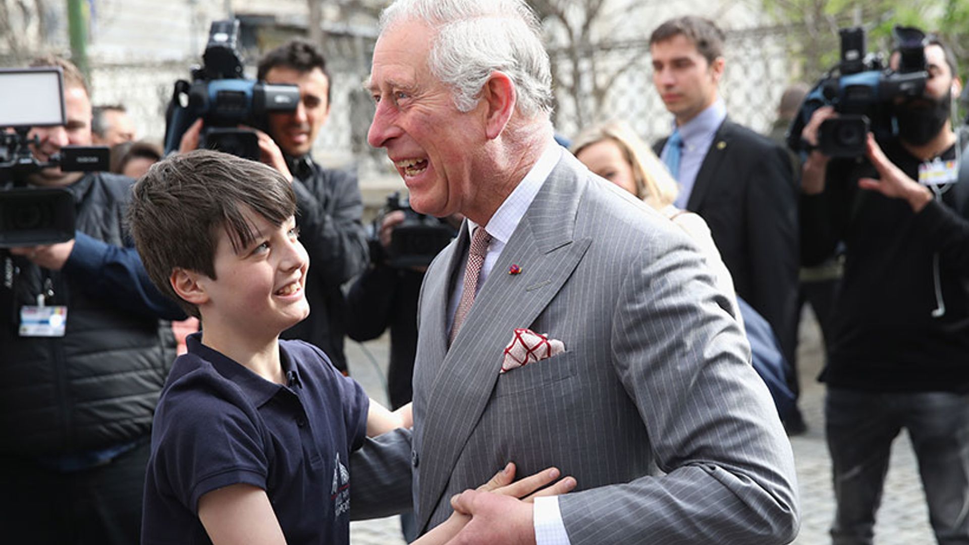 Prince Charles shares touching hug with Romanian schoolboy | HELLO!