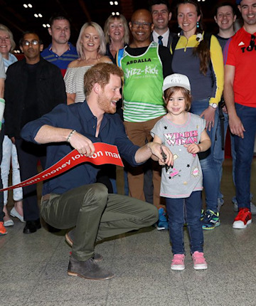 Prince Harry gets help from young friend as he opens London Marathon ...