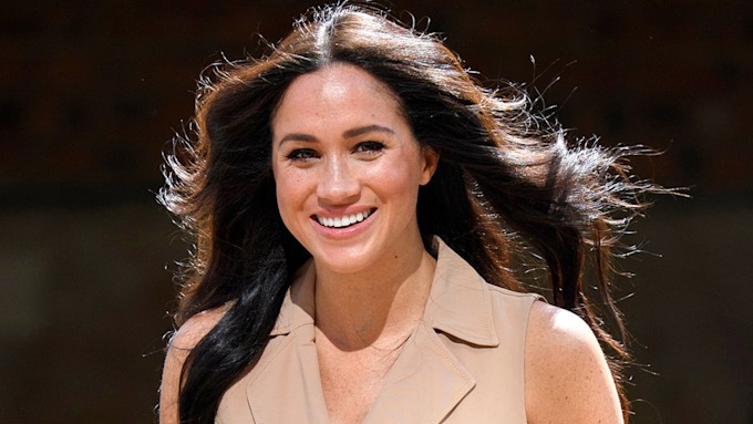 Meghan Markle beams next to private chef in never-before-seen photo ...