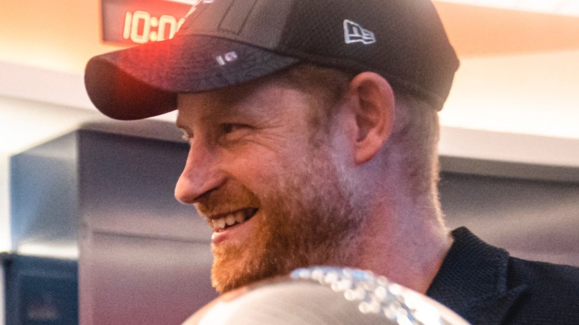 Prince Harry is all smiles as he joins LA Rams in the locker room after ...