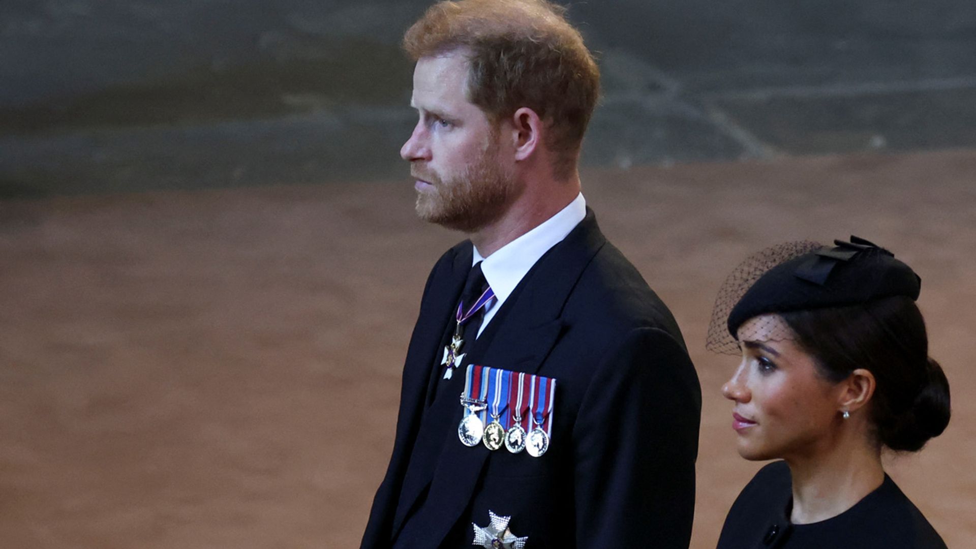 Why Meghan Markle & Prince Harry were really sat in the second row at Queen's funeral | HELLO!