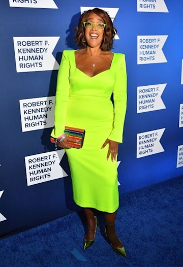 Meghan Markle and Prince Harry clasp hands as they make rare red carpet ...