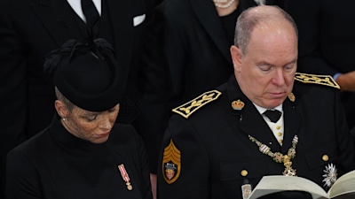 Pregnant Princess Charlene and Prince Albert dine with stars as they ...