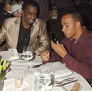 Home-grown race star Lewis joins Diddy for fragrance launch | HELLO!