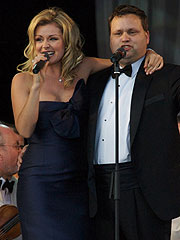 Paul sends the crowds potty as he performs with Katherine | HELLO!