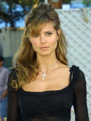 HEIDI KLUM RECEIVES AN UNUSUAL STAMP OF APPROVAL | HELLO!