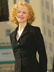 'NAUGHTY' NICOLE GETS A TELLING-OFF FROM DAME EDNA | HELLO!