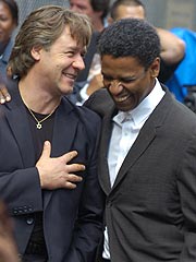 Russell and Denzel have a laugh on gangster set | HELLO!