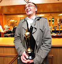 Danny Boyle shows off his Oscar down the local pub | HELLO!