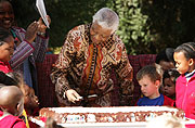 Children bring smile to Nelson Mandela's face in | HELLO!