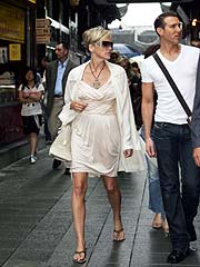 Sharon stops off in the Pearl of the Orient | HELLO!